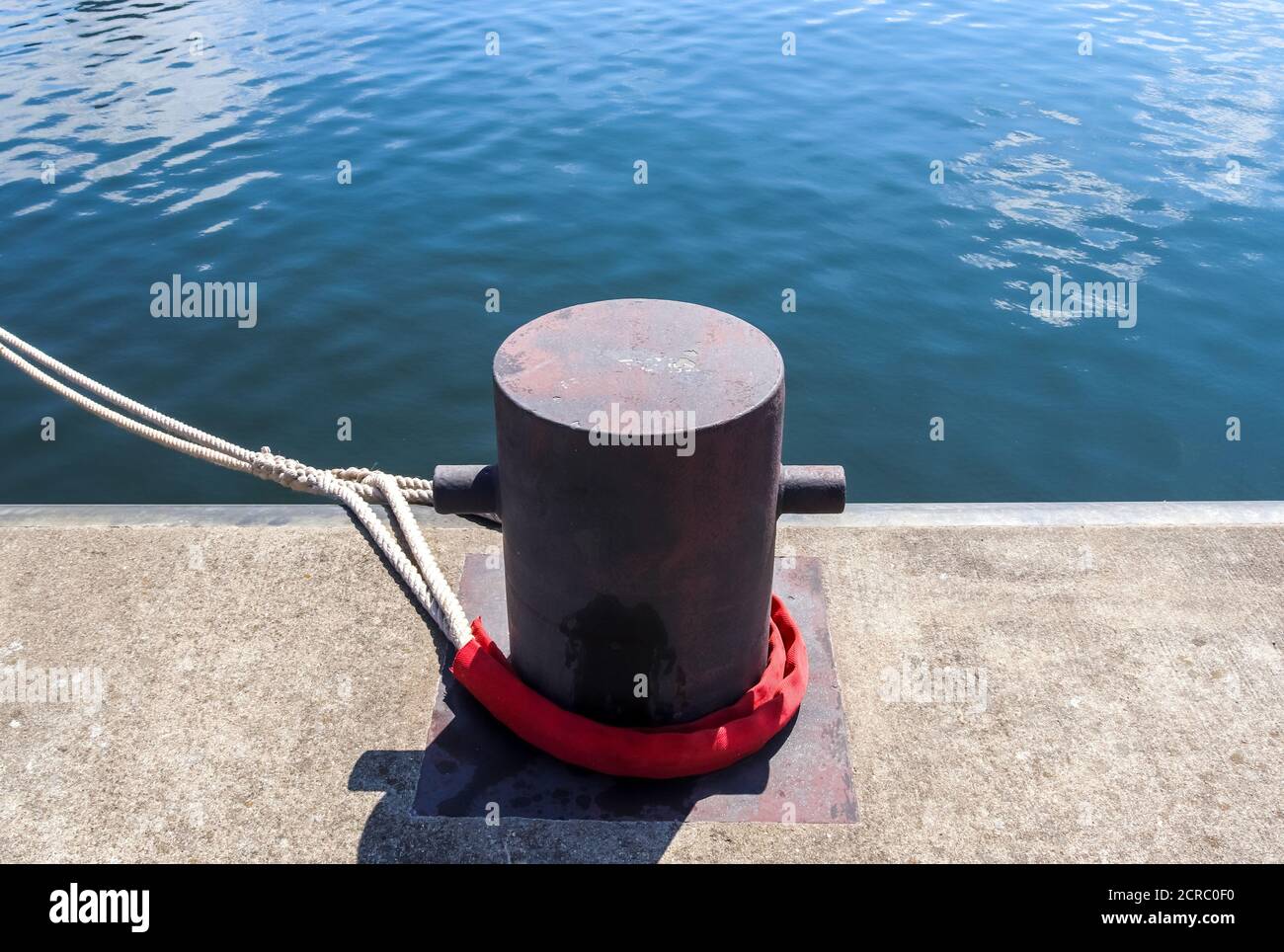 Closeup of a boat bollard on a dock Stock Photo - Alamy