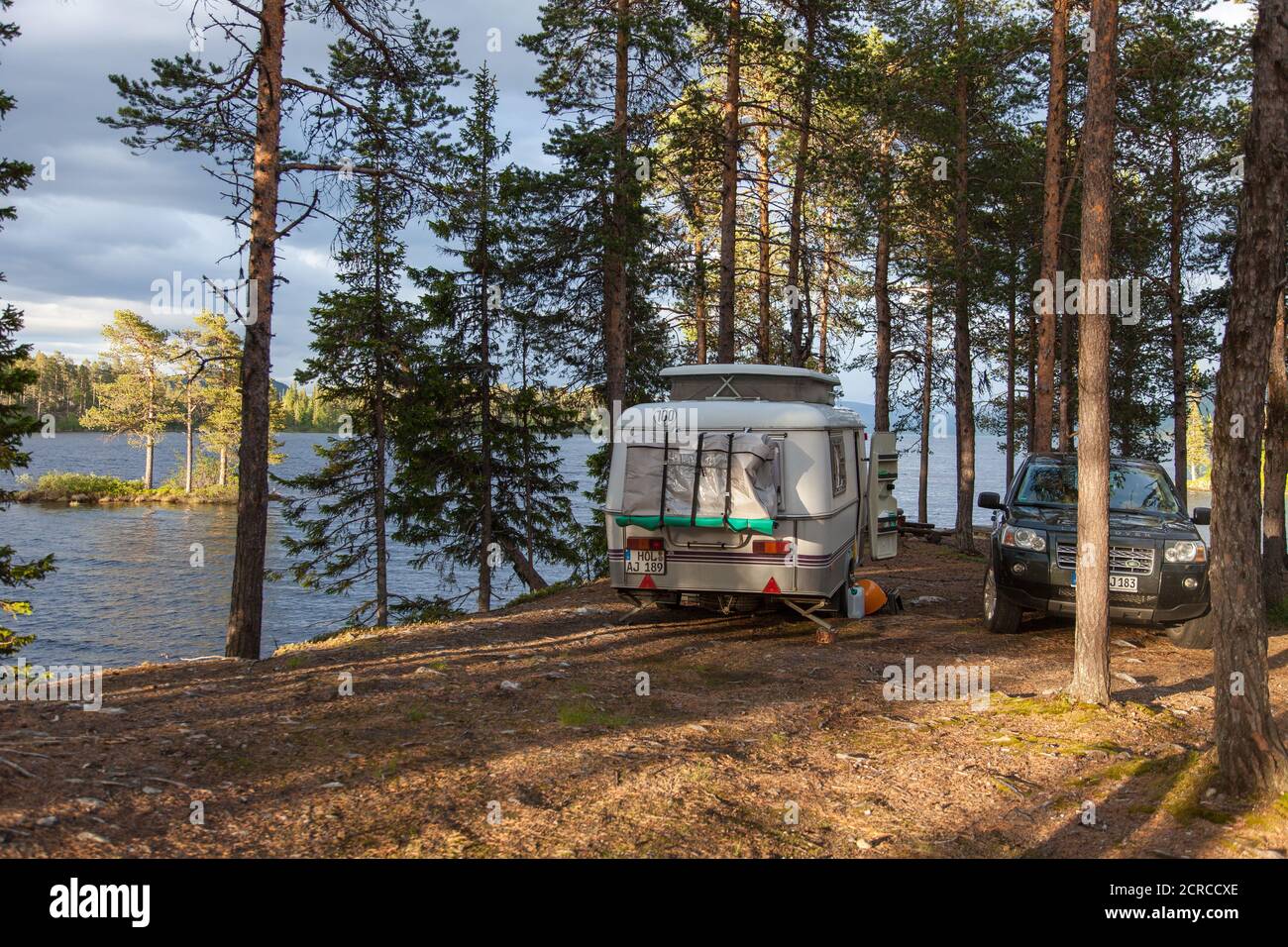 Caravan by a lake in Sweden Stock Photo - Alamy
