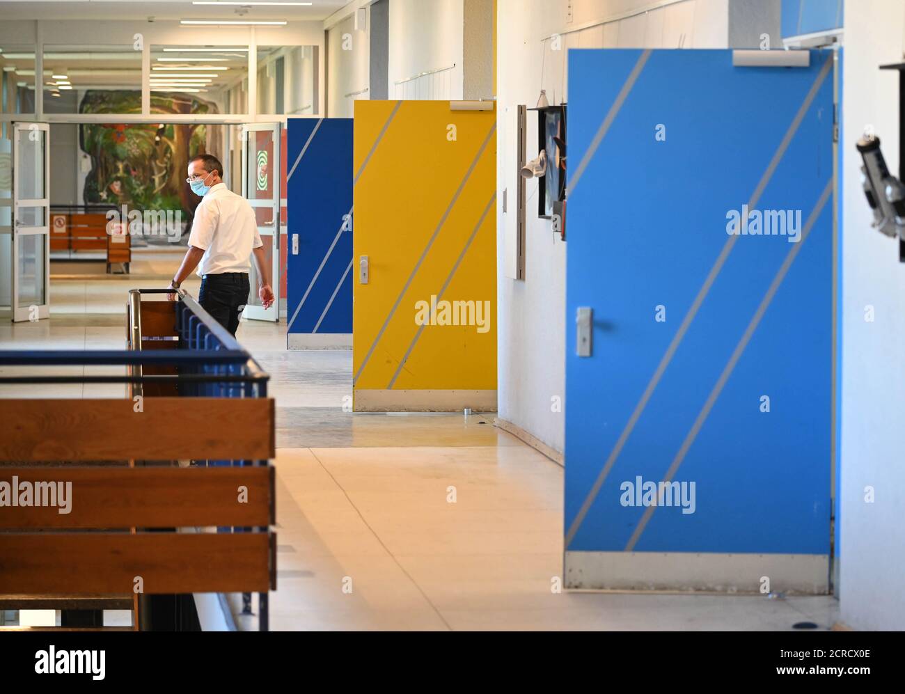 Open doors along corridor hi-res stock photography and images - Alamy