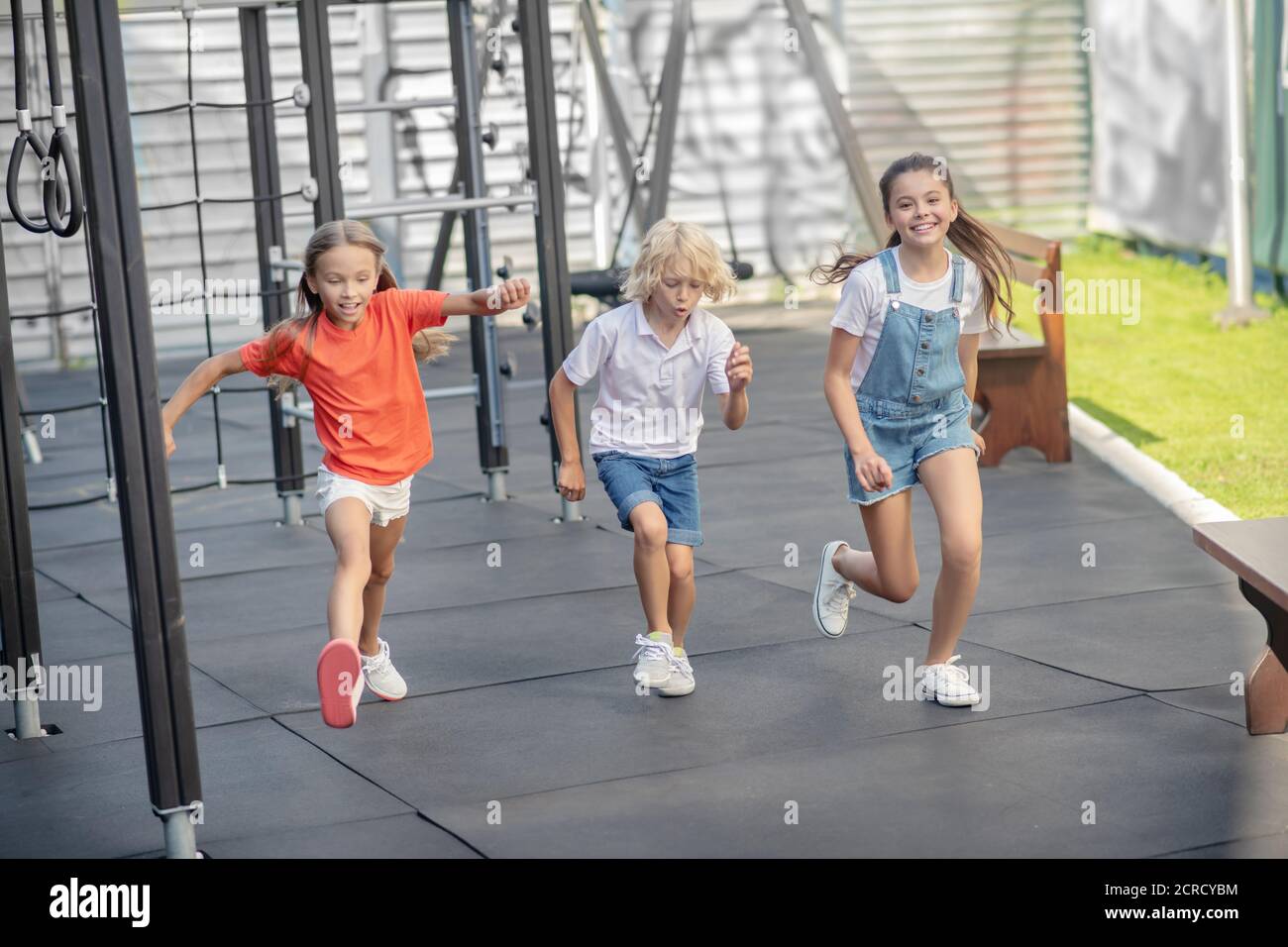 School children playground run hi-res stock photography and images - Alamy