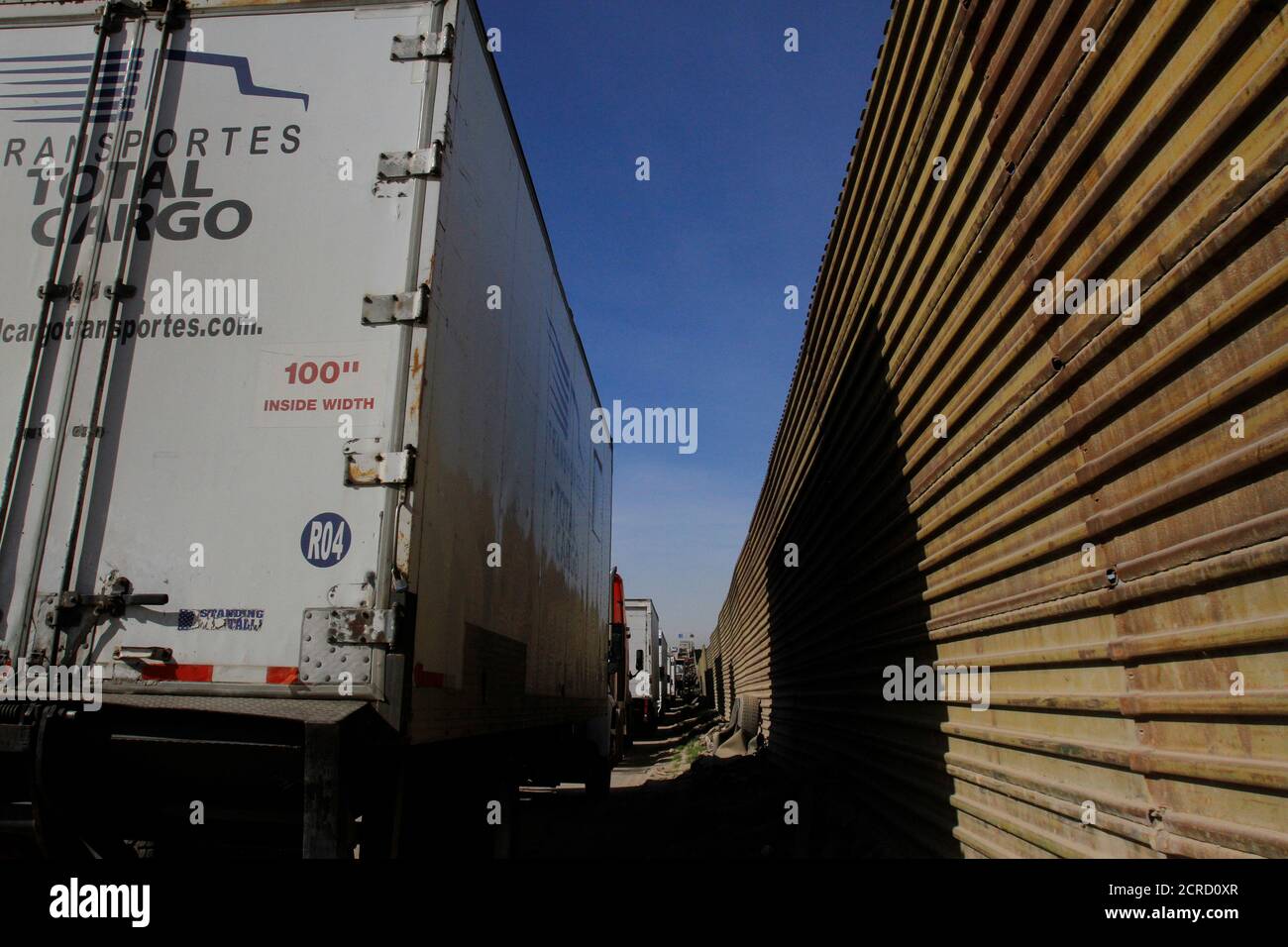 Mexico border crossing trucks hi-res stock photography and images - Alamy