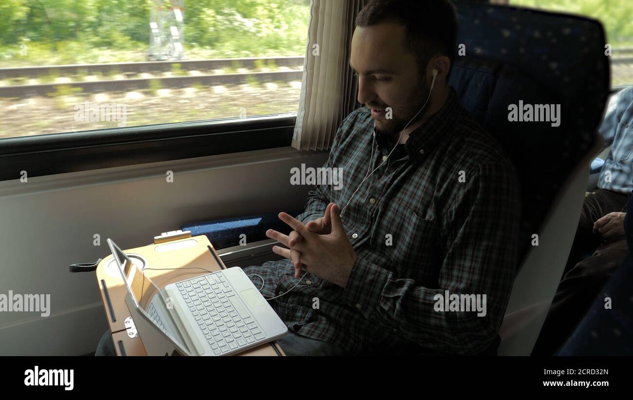 The train line laptop hi-res stock photography and images - Alamy