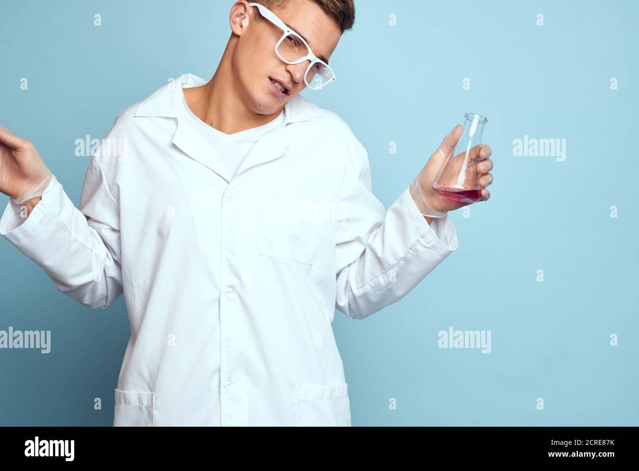 man holding flasks colorful liquid chemical laboratory model wearing ...