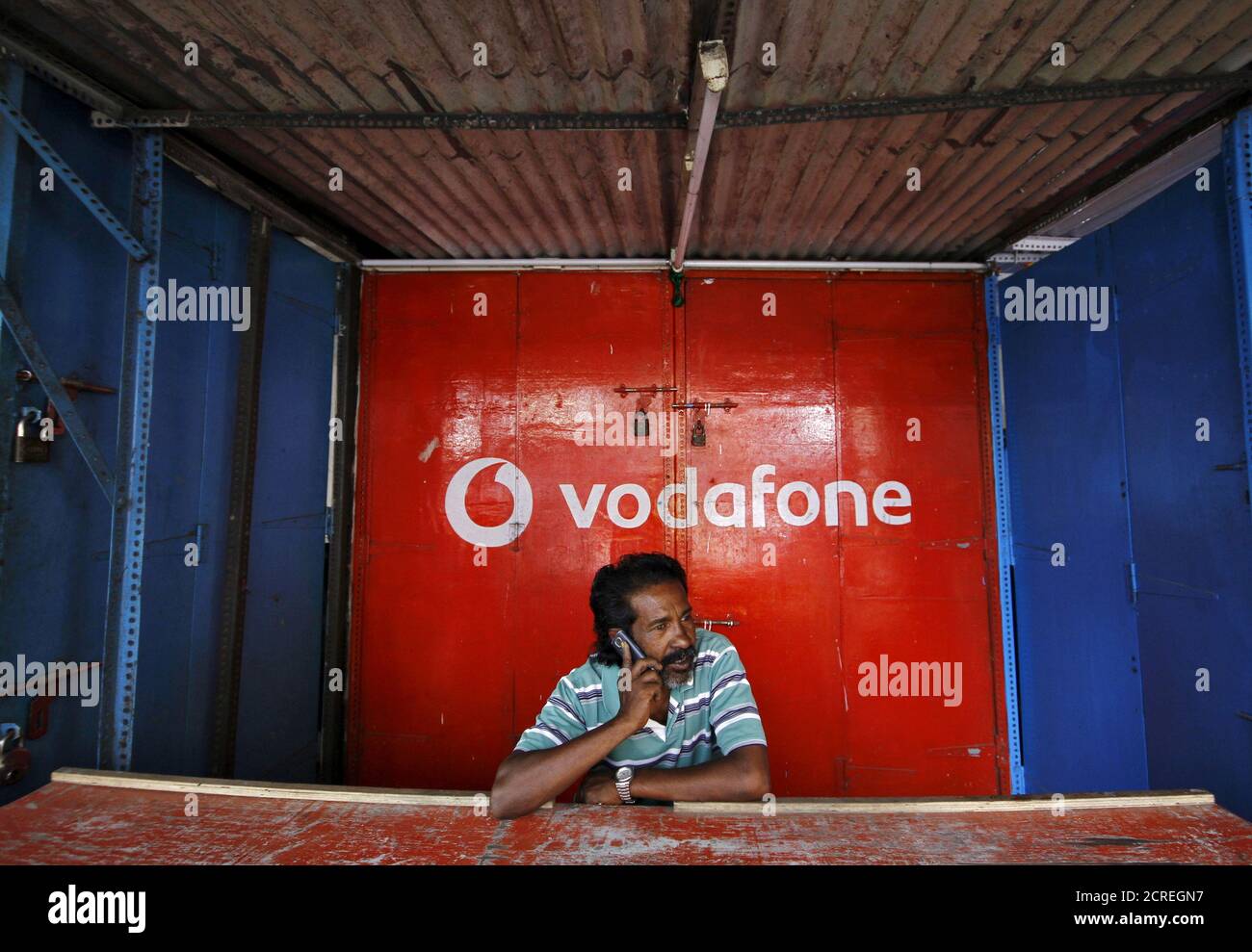 Indian mobile phone shop owner hi-res stock photography and images - Alamy