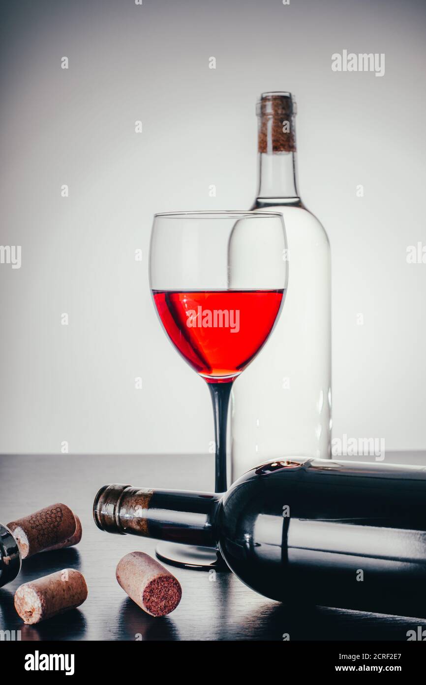 white and red wine on a wooden table Stock Photo - Alamy