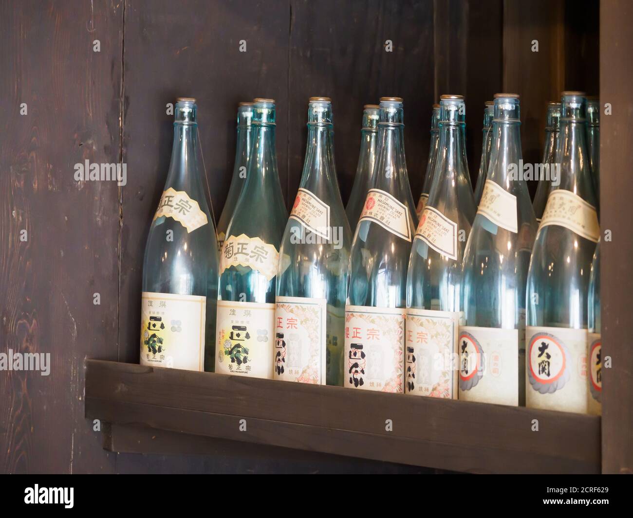 Old sake bottles in Japan Stock Photo - Alamy