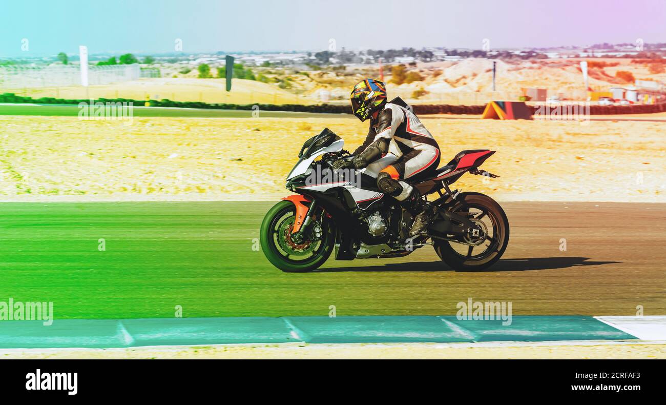 competition, motorcycle racer rides on a sports track Stock Photo - Alamy
