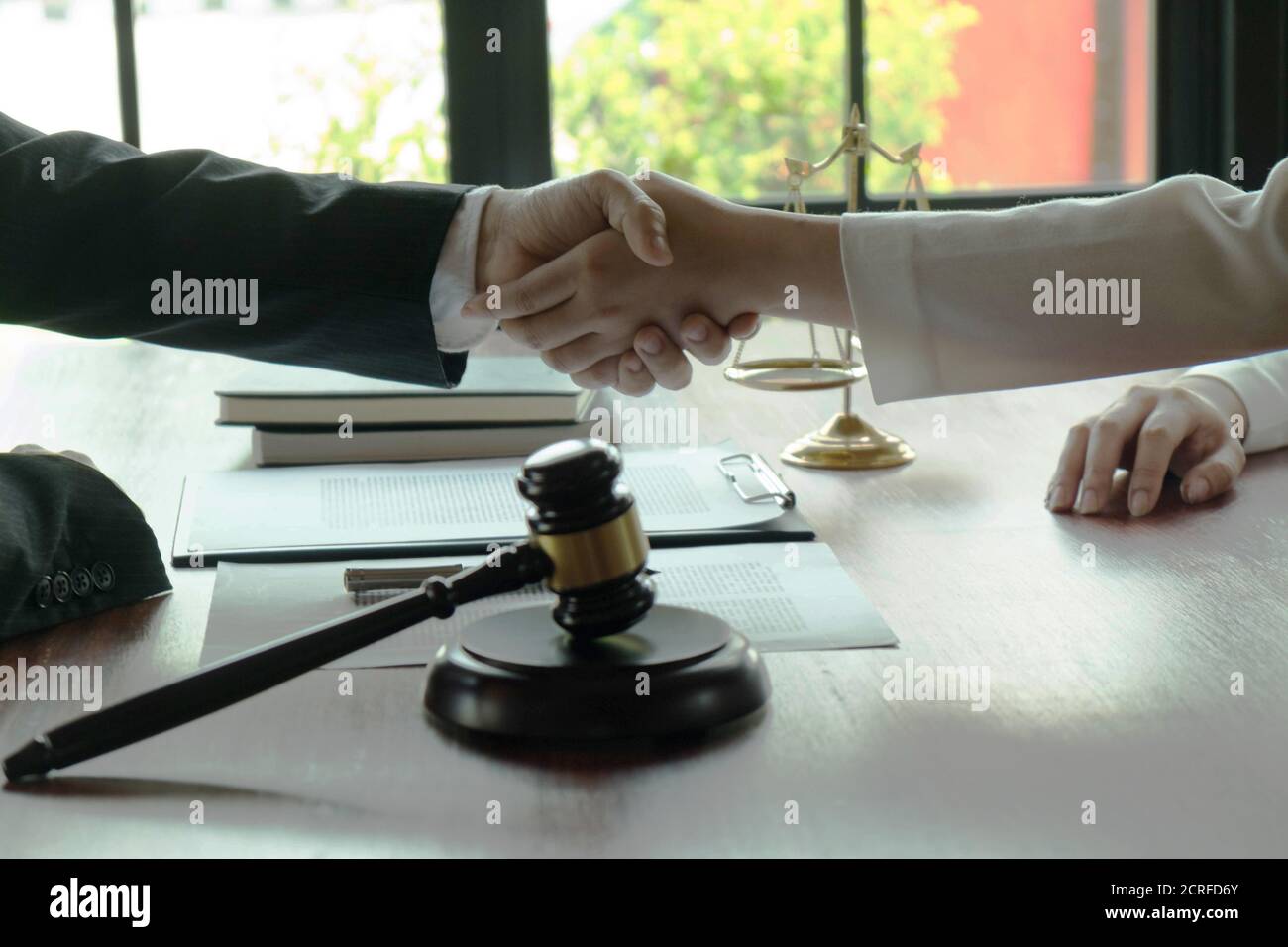 Business handshake. Business people shaking hands, finishing up a ...