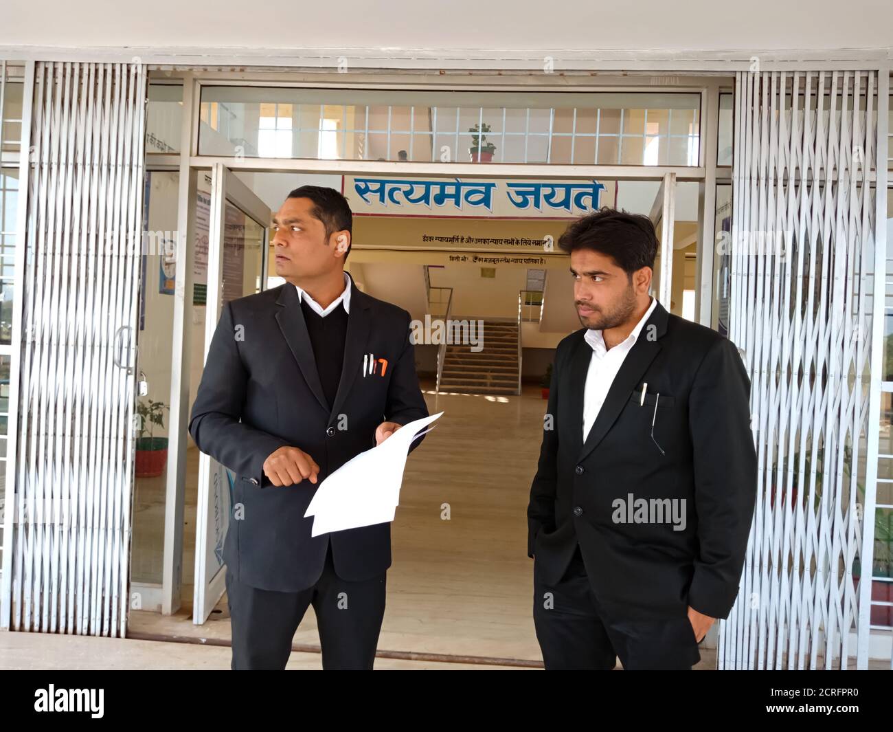 DISTRICT KATNI, INDIA - JANUARY 27, 2020: Two Indian lawyers standing ...