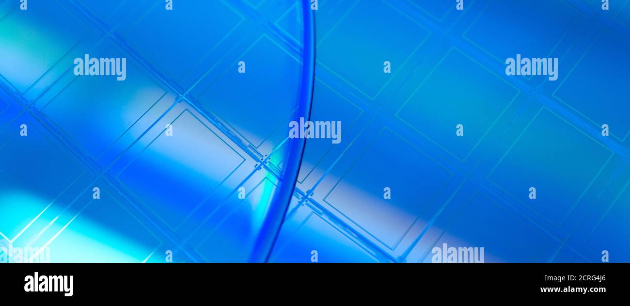 Macro of blue silicon wafer with microchips.Banner format Stock Photo ...