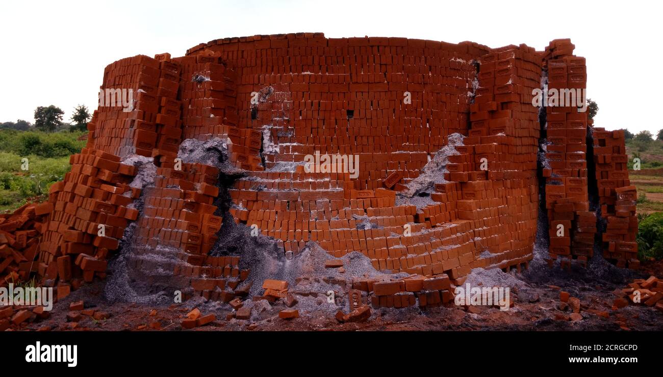 Red soil made bricks manufacturing with indian traditional fire kiln at ...