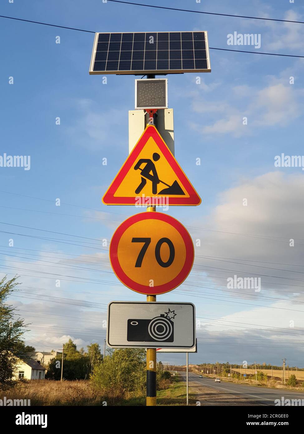 road sign repair work and speed limit Stock Photo - Alamy