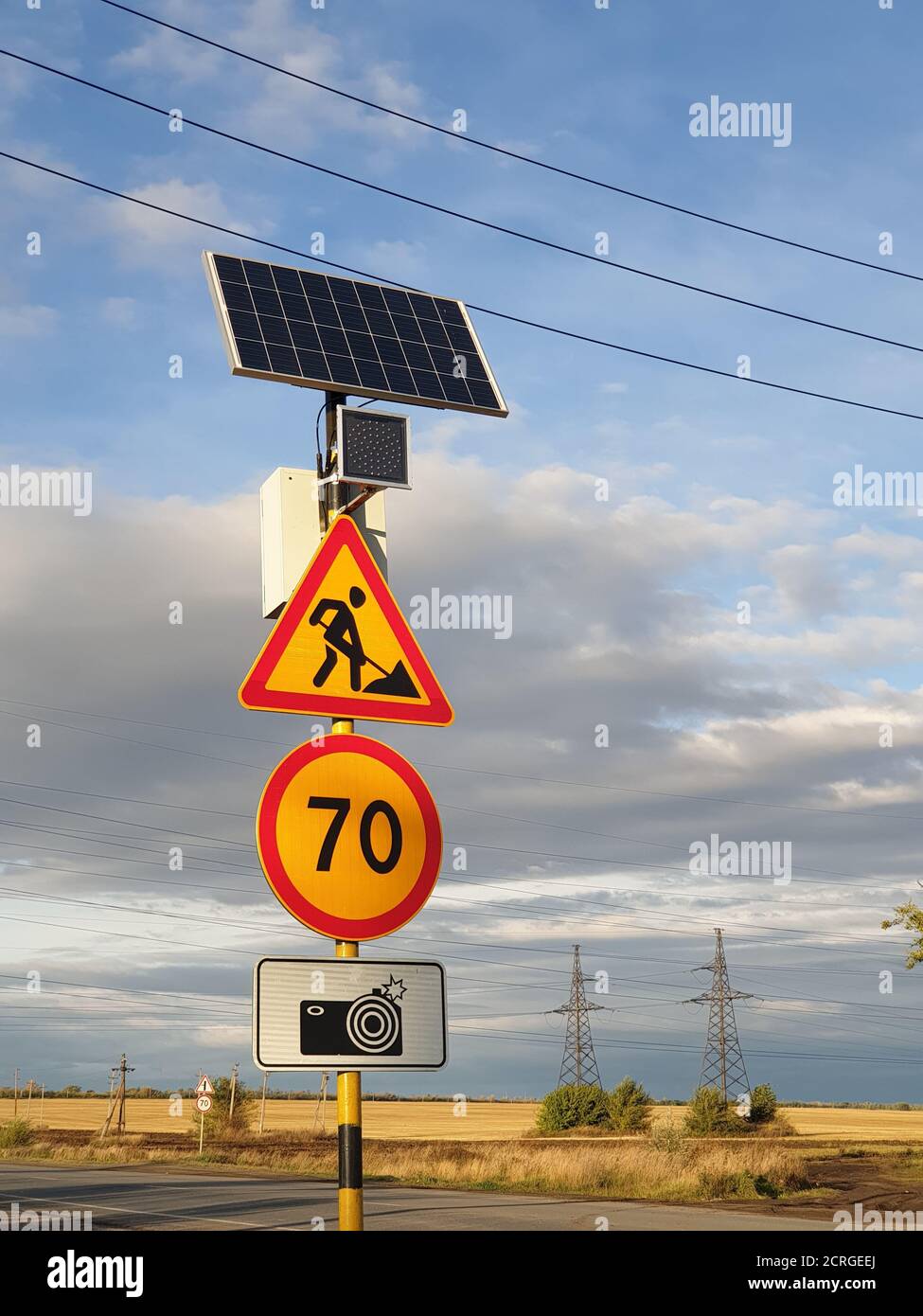 road sign repair work and speed limit Stock Photo - Alamy