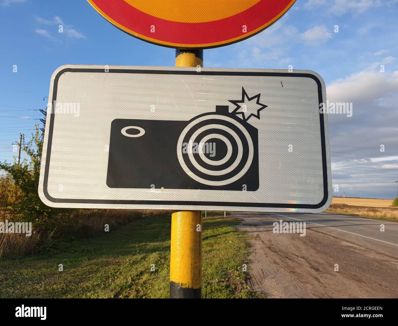 road sign speed camera and road works Stock Photo - Alamy