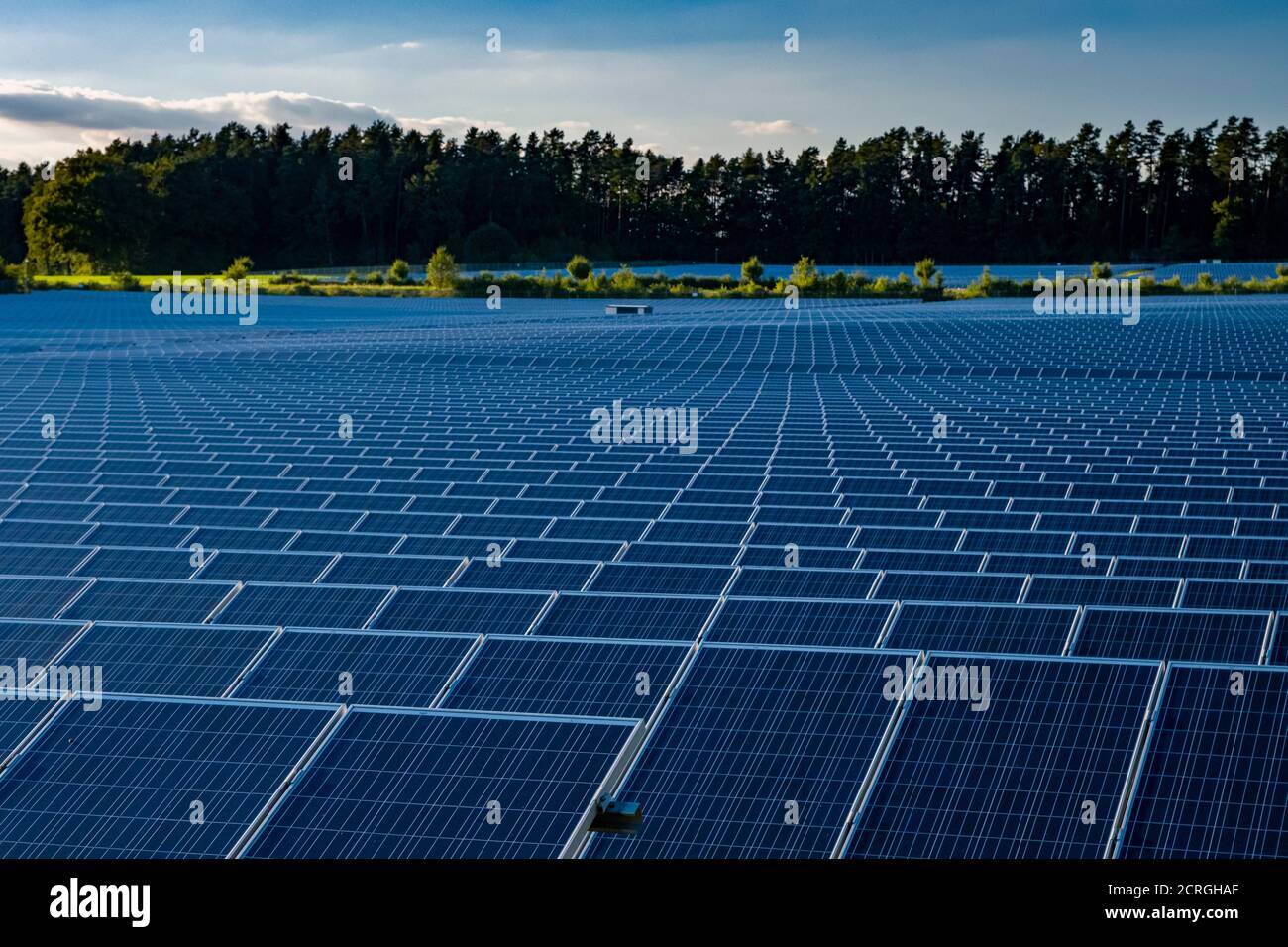 Many Photovoltaik solar panels arranged as part of a big solar ...
