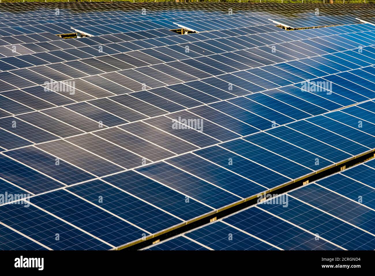 Many Photovoltaik solar panels arranged as part of a big solar ...