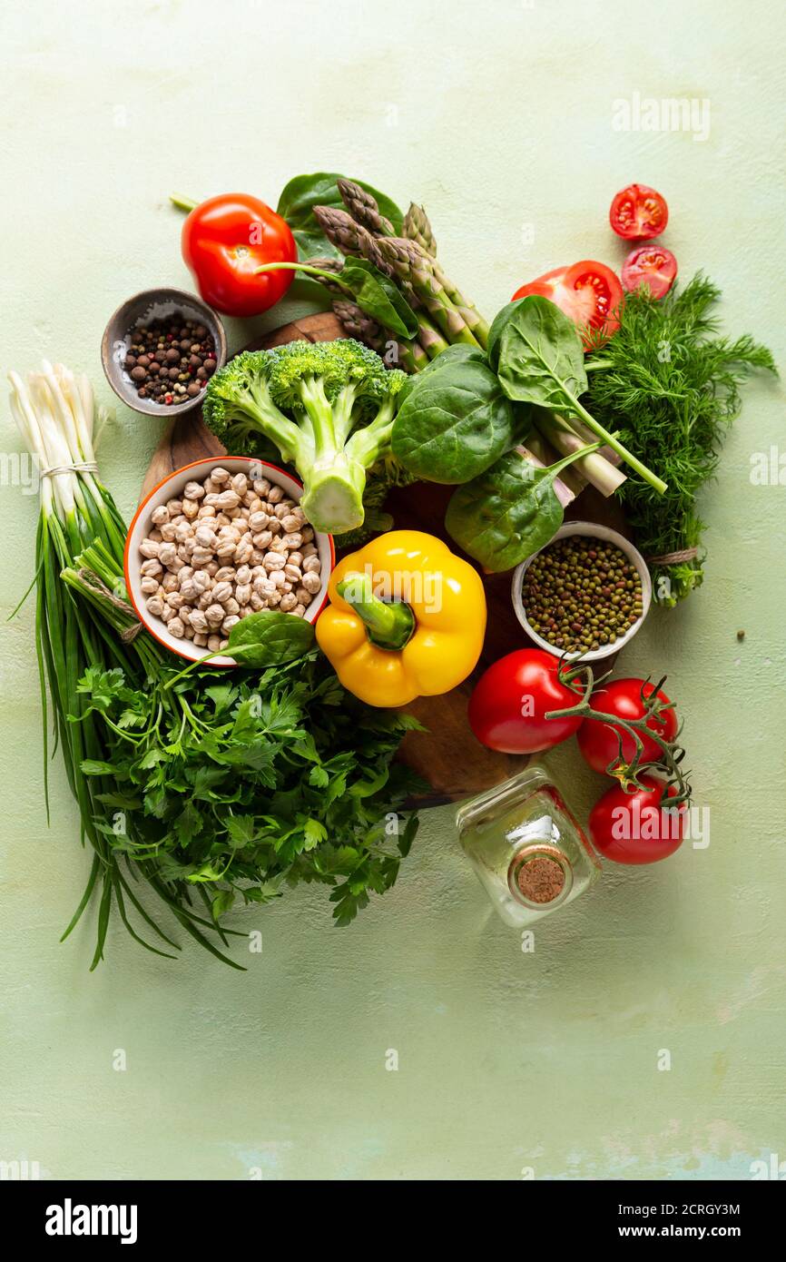 Set of green vegan protein food on green surface Stock Photo - Alamy