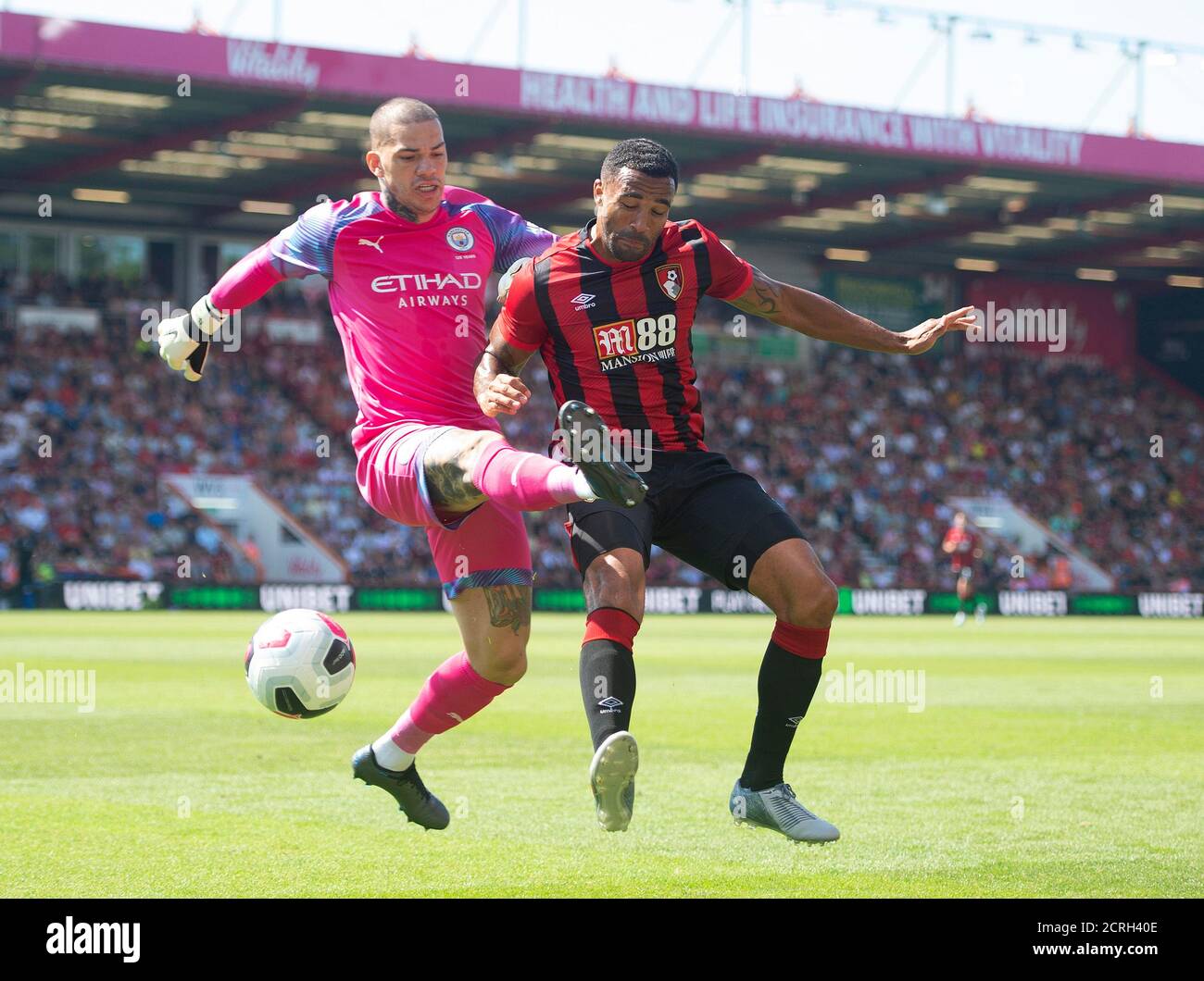 Manchester City's Goalkeeper Ederson challenges Bournemouth's Callum ...
