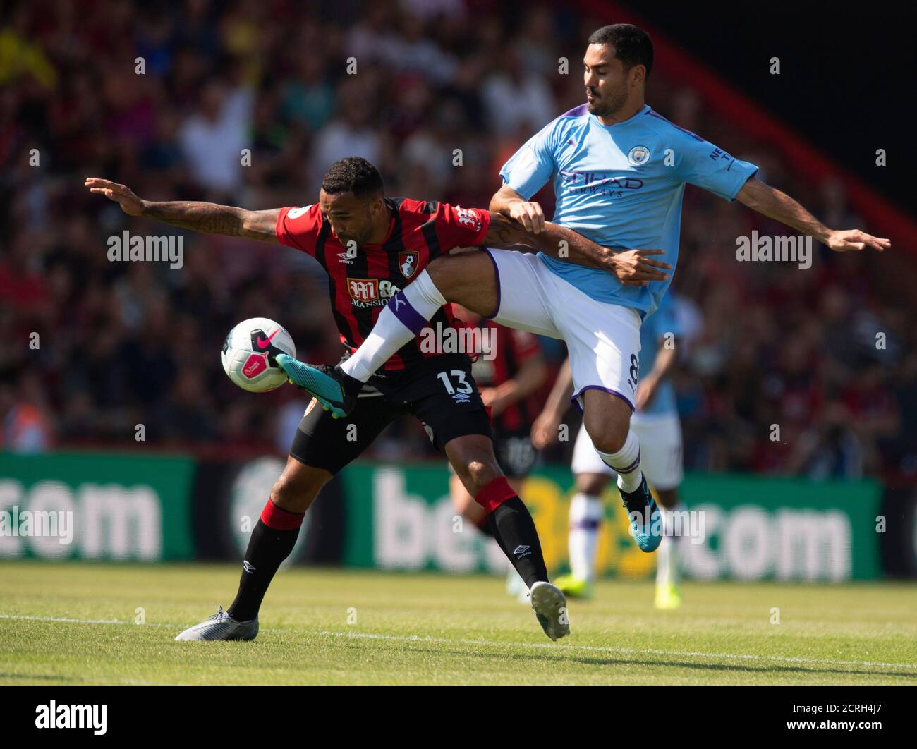 Bournemouth's Callum Wilson battles with Manchester City's Ilkay ...