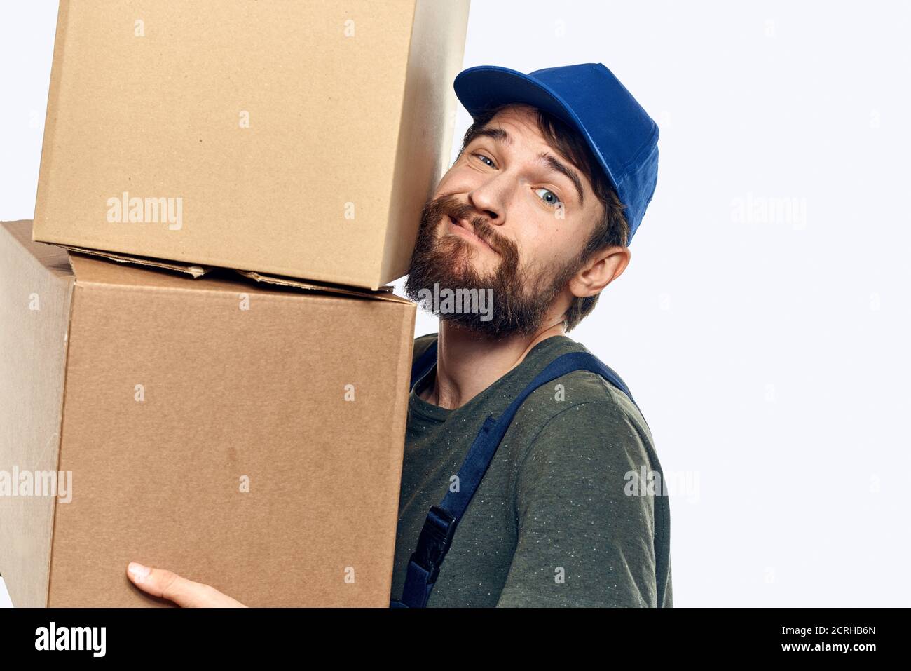 Working man with boxes in hands delivery service work lifestyle Stock ...