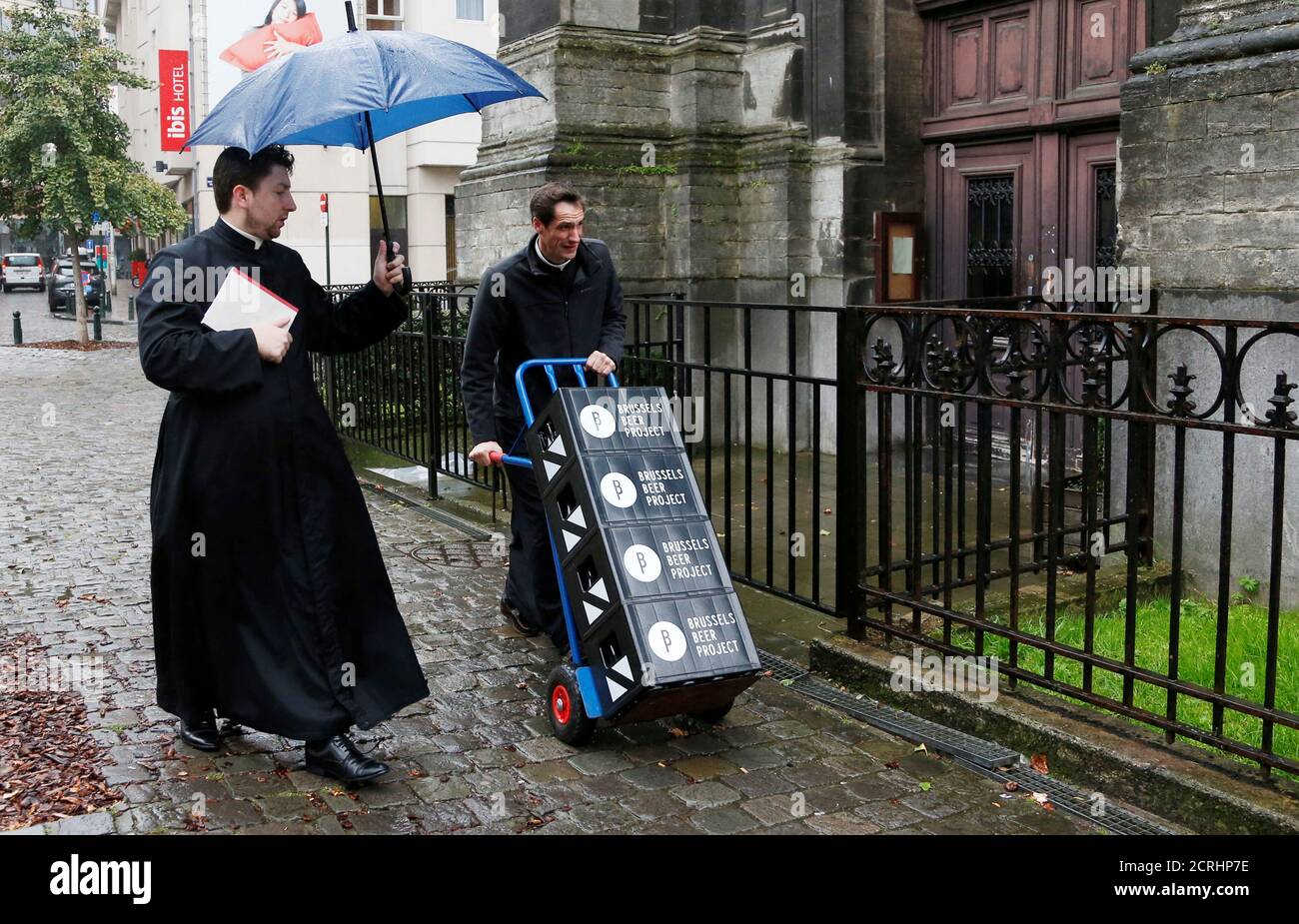Belgian priests Kurt and Jeremie deliver crates of a new beer called ...
