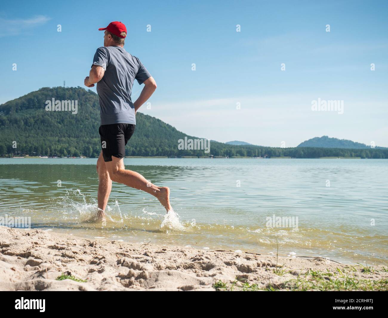 Female legs in black bikini hi-res stock photography and images - Alamy
