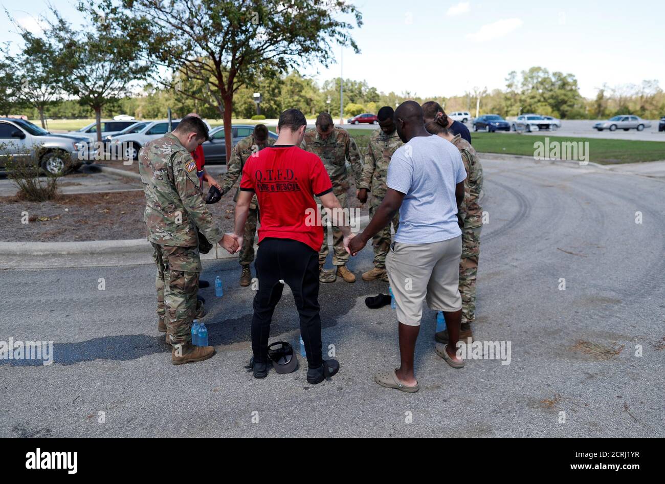 Prayer circle in disaster hi-res stock photography and images - Alamy