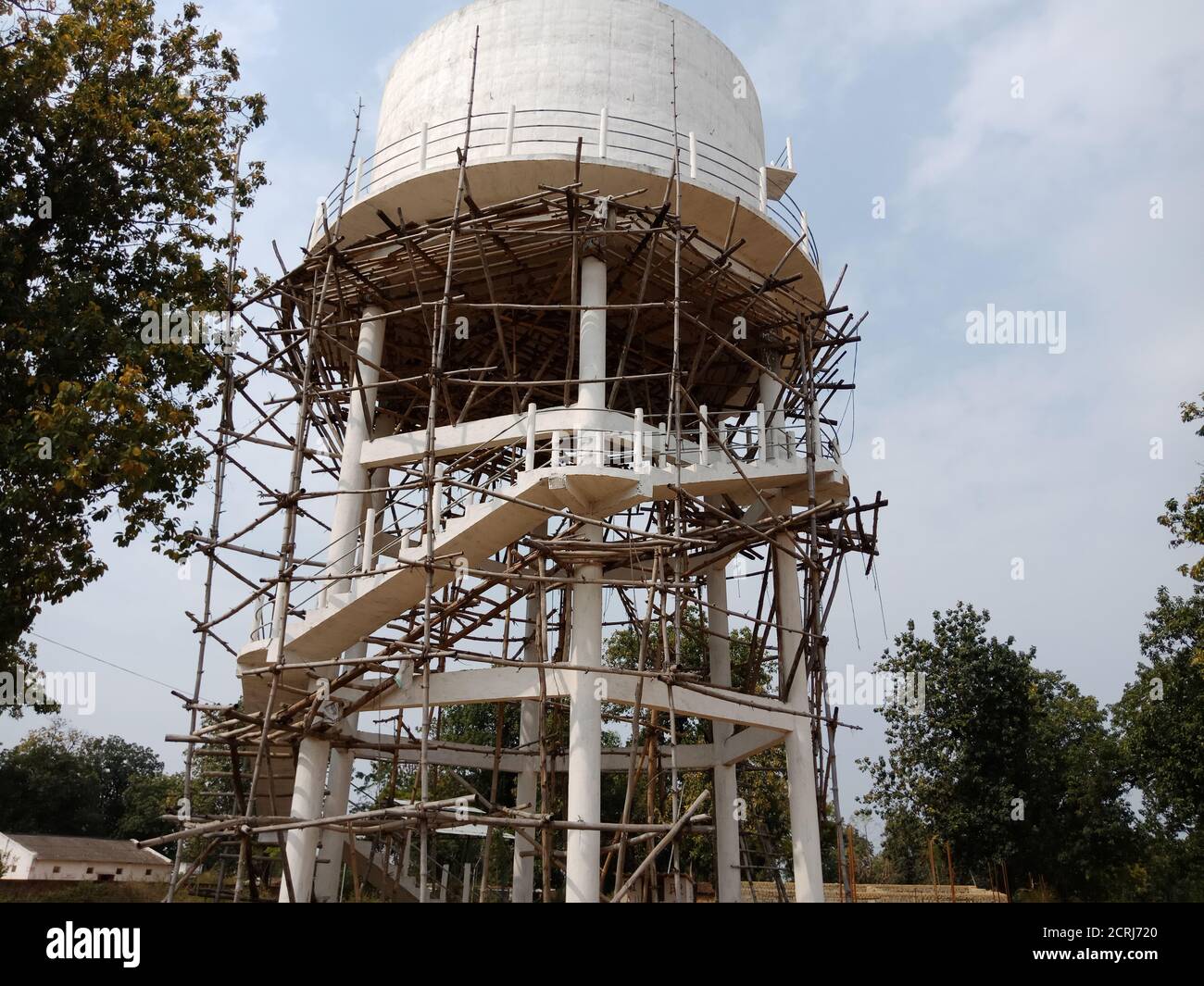 Isolated cemented water tank construction on sky background Stock Photo ...