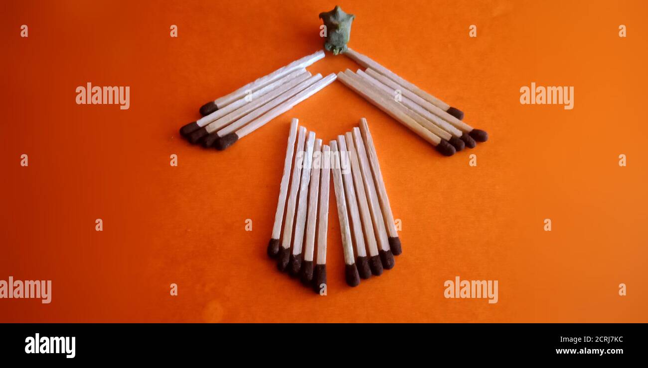 matchstick art display on human shape at orange background Stock Photo ...