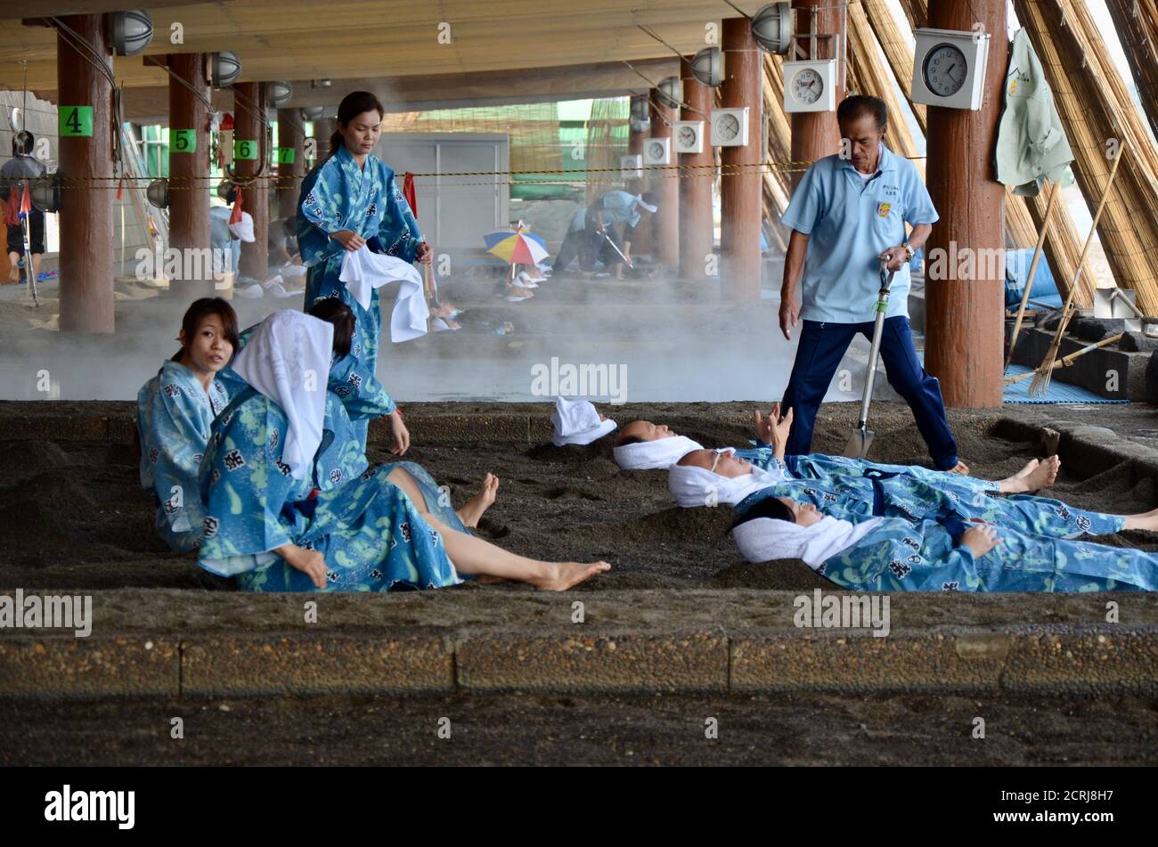 Bath of hot sand on the beach of the Ibusuki Sunamushi Onsen Stock ...