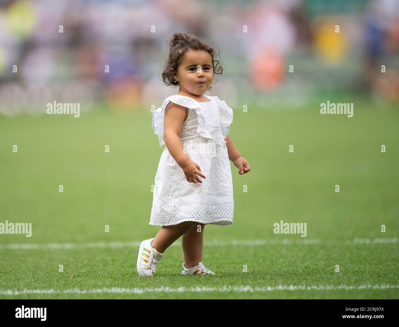 England's Manu Tuilagis daughter smiles at the Twickenham crowd as they ...