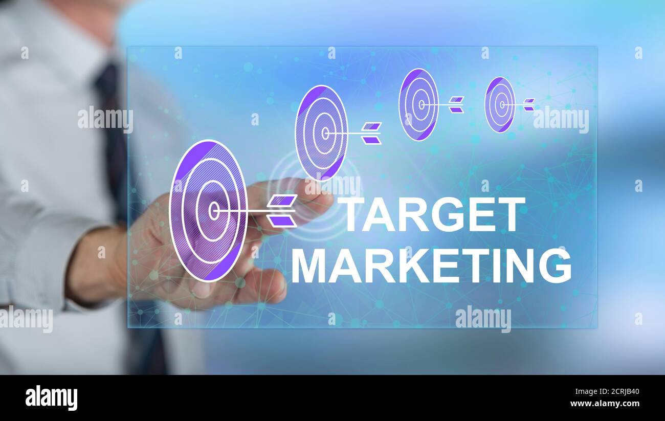 Man touching a target marketing concept on a touch screen with his ...