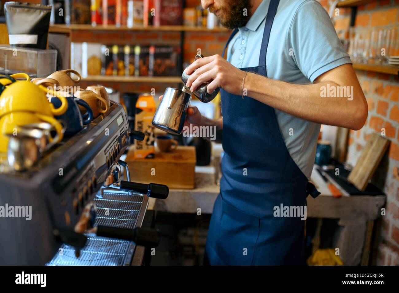 Handsome barista making cup coffee hi-res stock photography and images ...