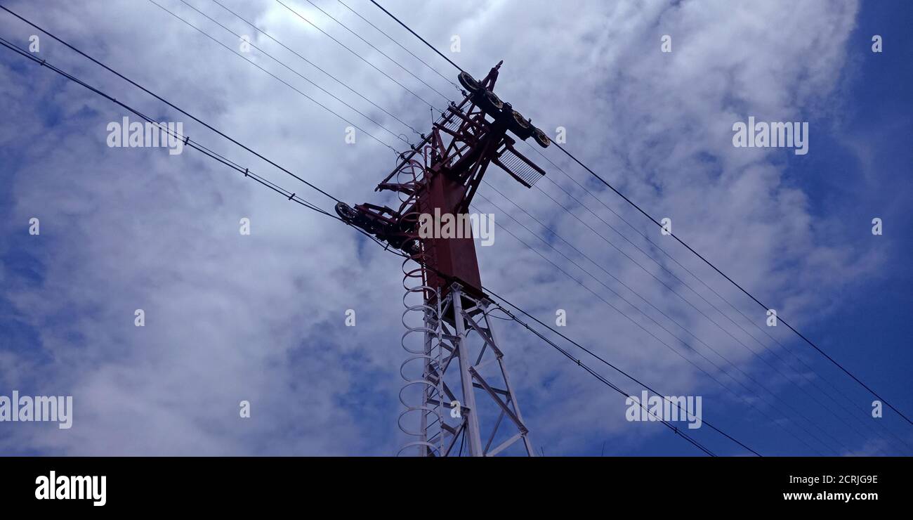 Ropeway tower presentation on river side hill station in blue sky ...