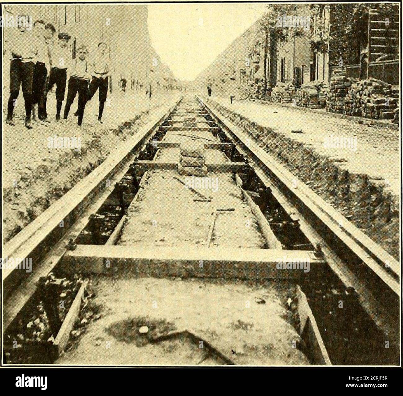. The Street railway journal . FIG. 10.—RAIL CLAMPED TO TEMPORARY TIES ...