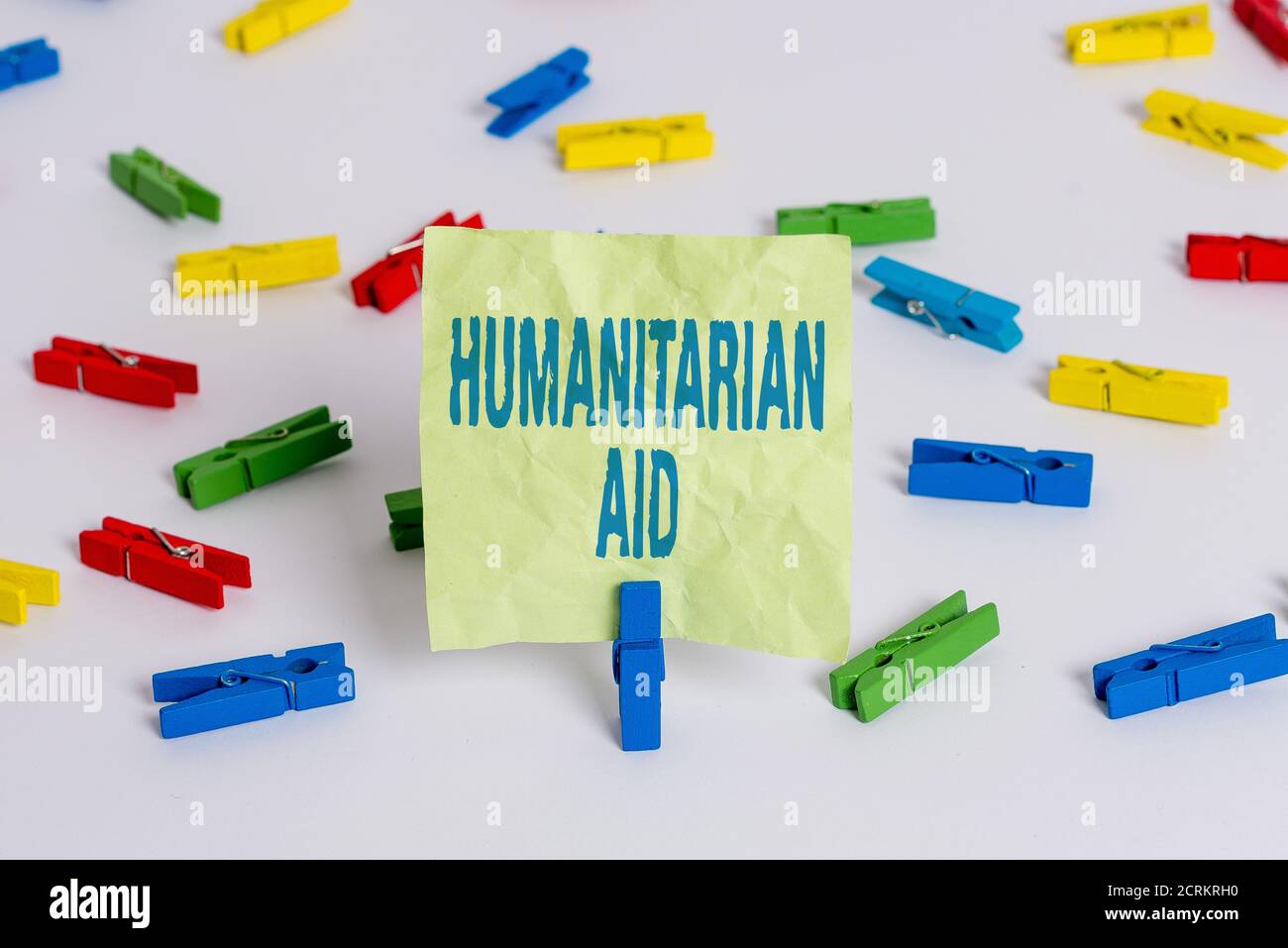 Writing note showing Humanitarian Aid. Business concept for immediate ...