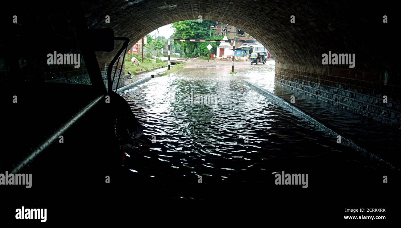 Water logging down the bridge during raining season Stock Photo - Alamy