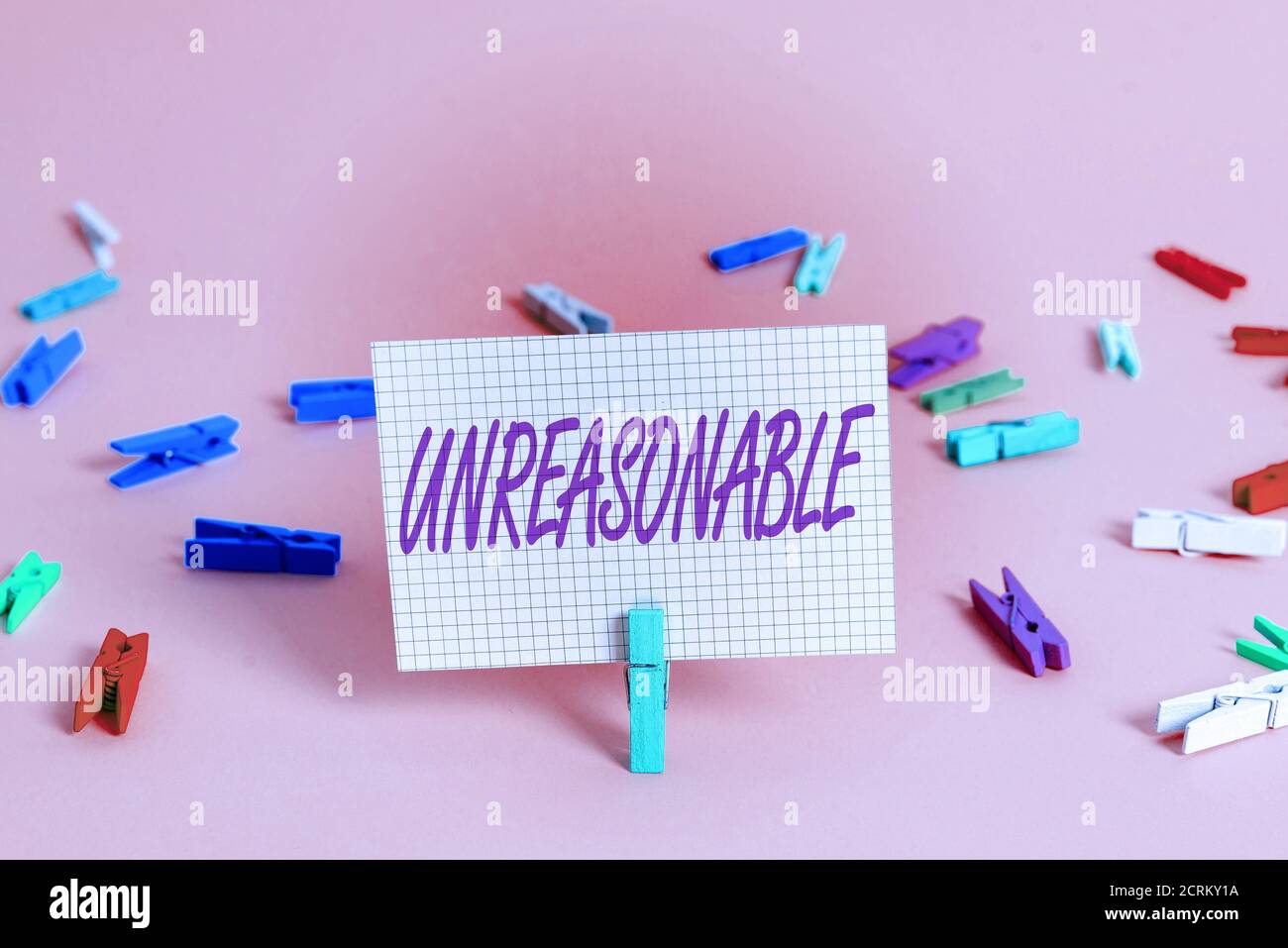 Writing note showing Unreasonable. Business concept for not conformable ...