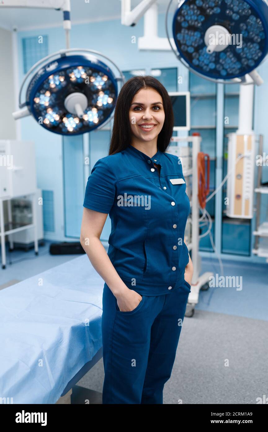 Smiling female surgeon in operating room Stock Photo - Alamy