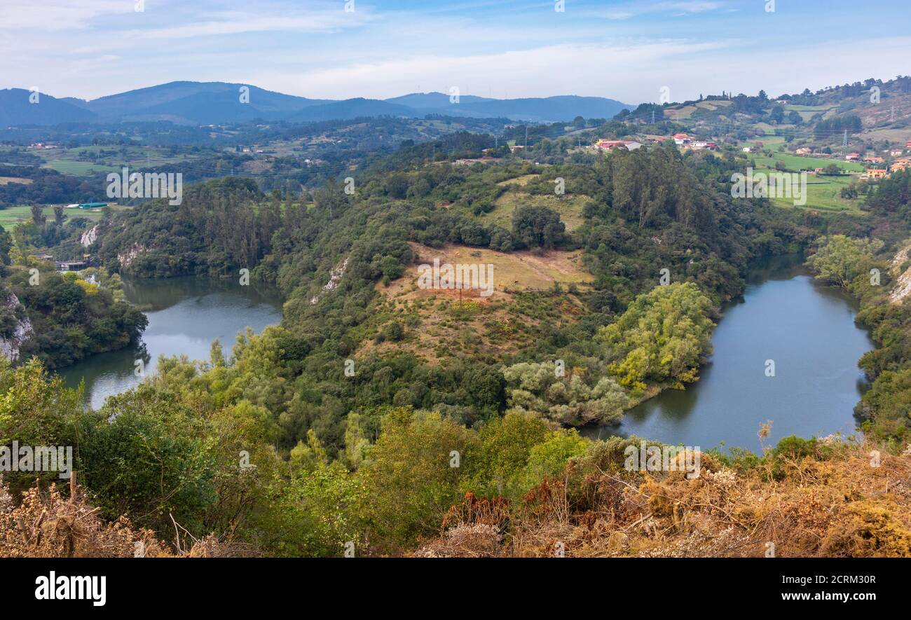 Lookout on the Nora river, surrounded by forests and trees. Mountains ...