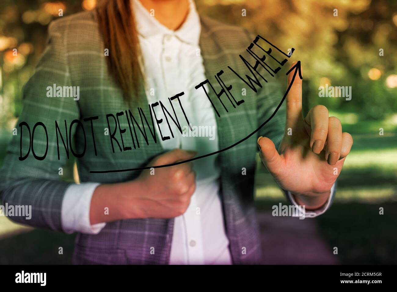 Writing note showing Do Not Reinvent The Wheel. Business concept for ...