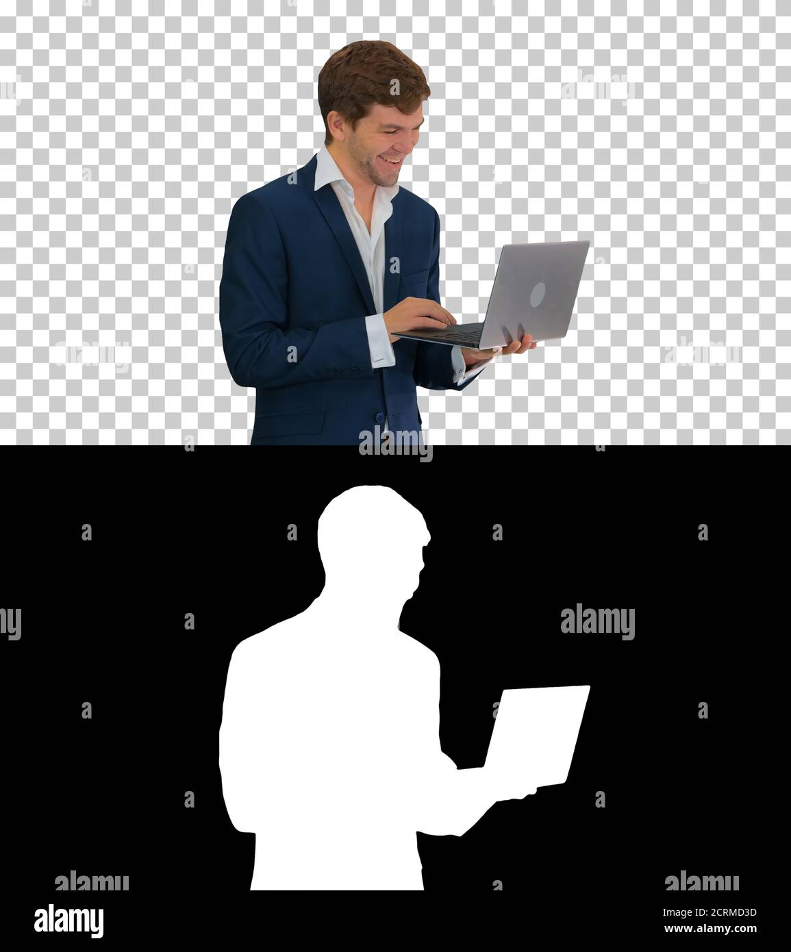 Smiling young businessman using laptop while standing, Alpha Cha Stock ...