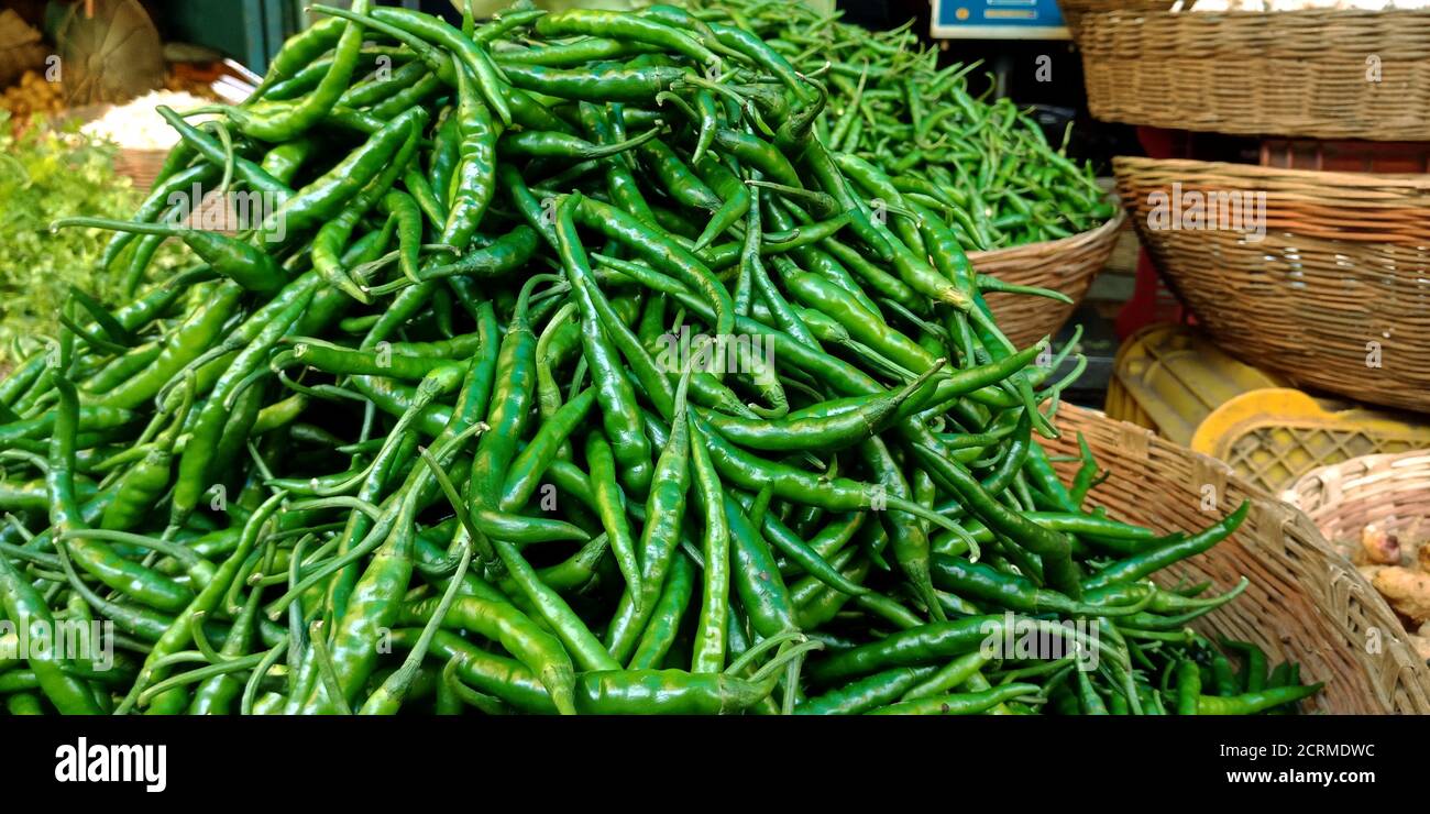 Fresh green chillies isolate with mix agriculture produce farmers ...