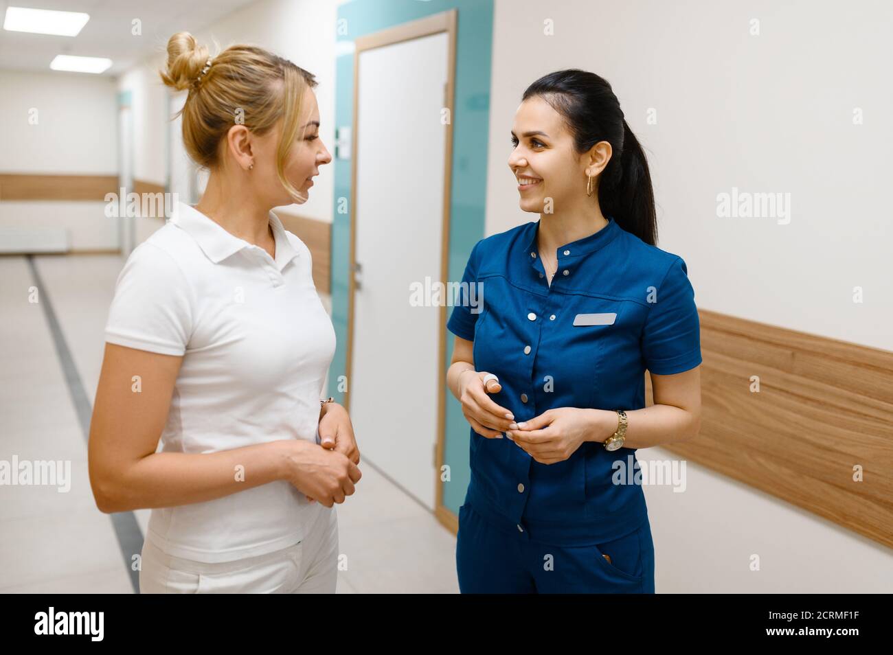 Female dentist talking woman hi-res stock photography and images - Alamy