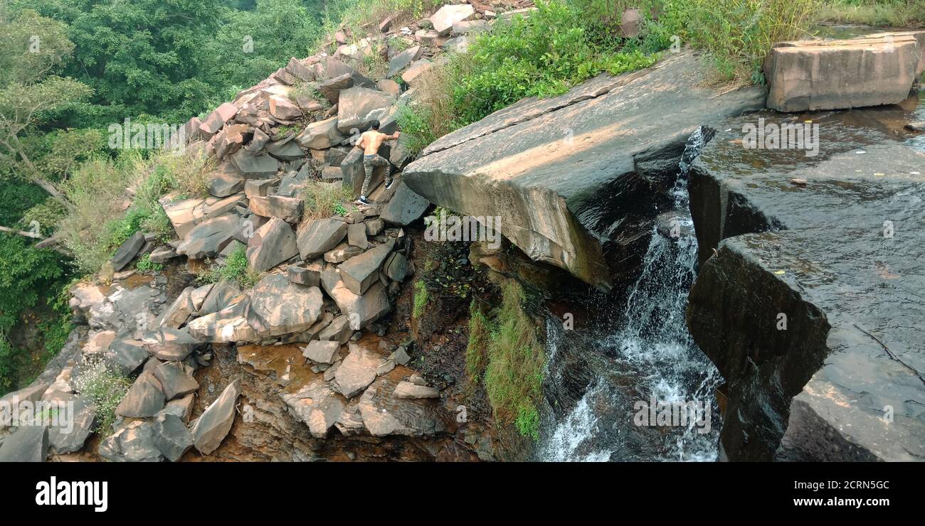 Amazing water falling between the rock stone on hill station at indian ...