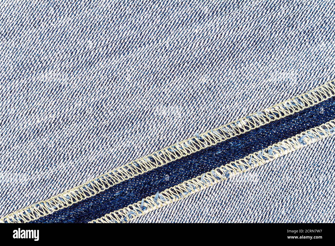 Wrong side of jeans fabric with back seam Stock Photo - Alamy