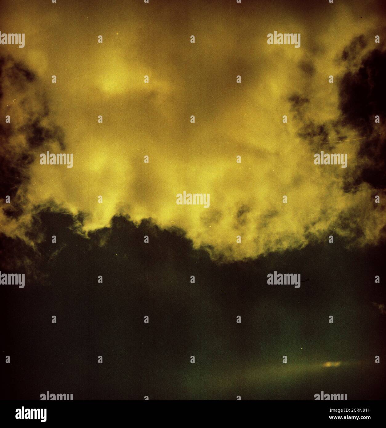 Grunge image of sky with clouds on grainy and dusty film texture ...