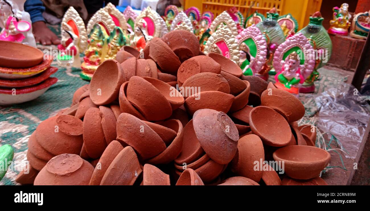 Hand made diya presented for Diwali pooja on market area Stock Photo ...