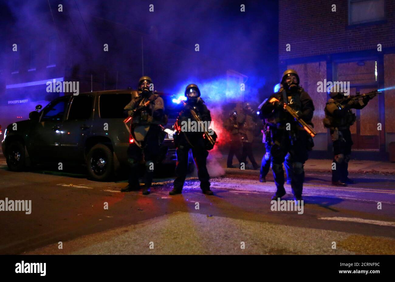 Police with gas masks hi-res stock photography and images - Alamy