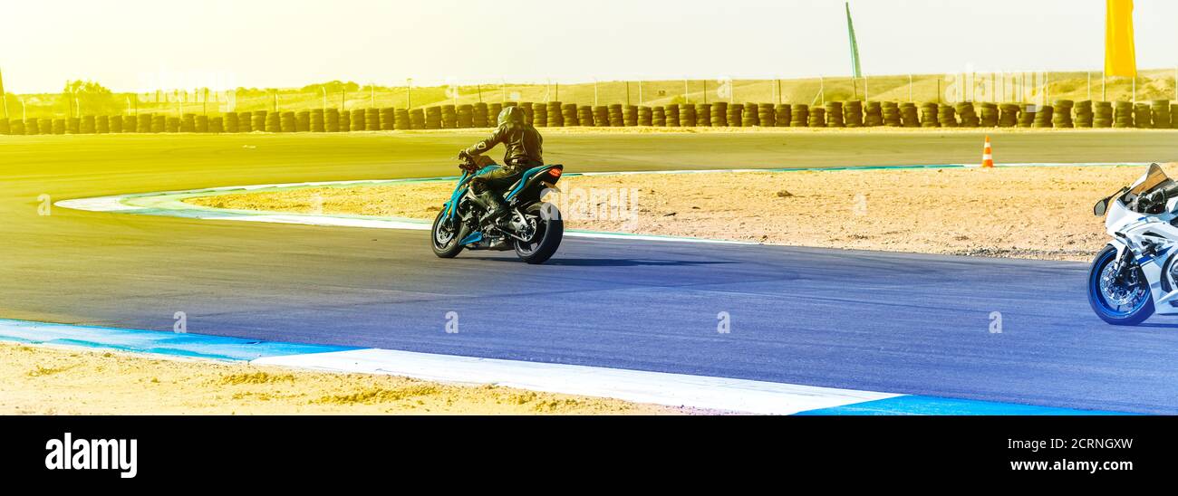 competition, motorcycle racer rides on a sports track Stock Photo - Alamy